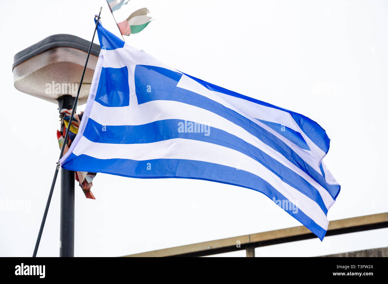 Greek flag flying in London Stock Photo - Alamy