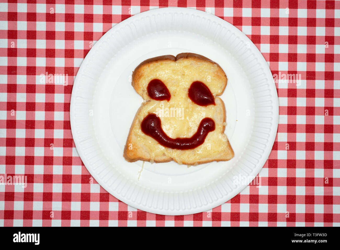 Cheese on toast with tomato ketchup Stock Photo - Alamy