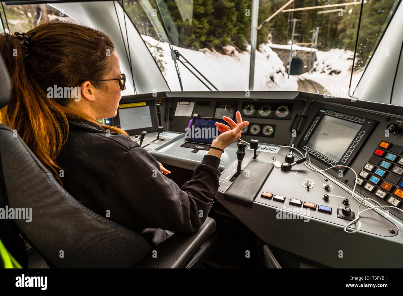 Female train driver in Switzerland. The train ride in a driver's cab of ...