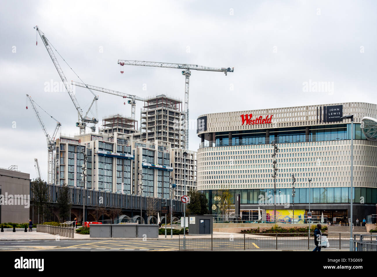 Construction work involving tall cranes behind the Westfield shopping ...