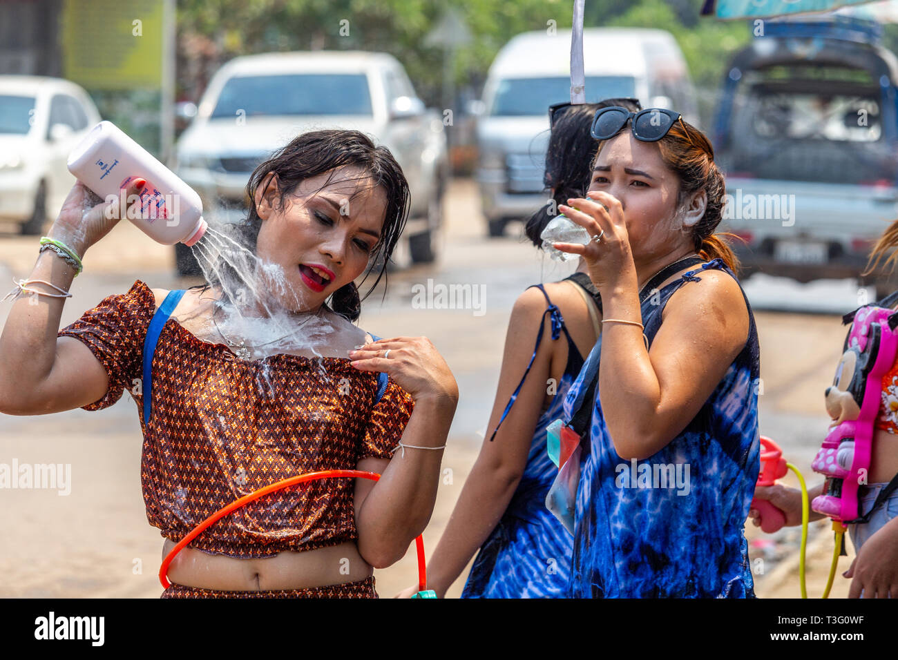 Vang Vieng, Laos - April 14, 2018: Local people throwing talcum powder ...