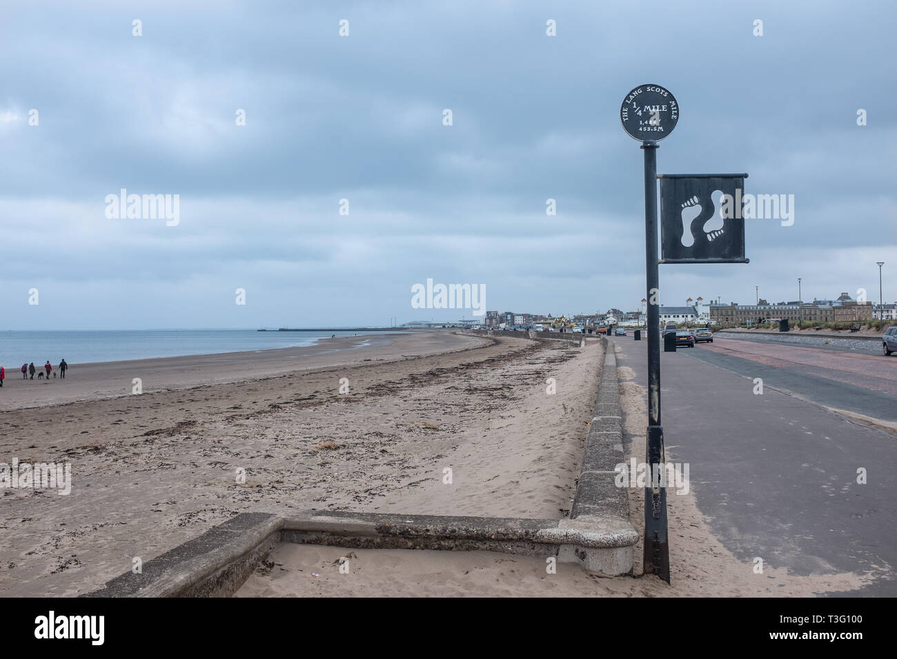 Sign indicating the Lang Scots Mile along the Ayr beachfront shoreline ...