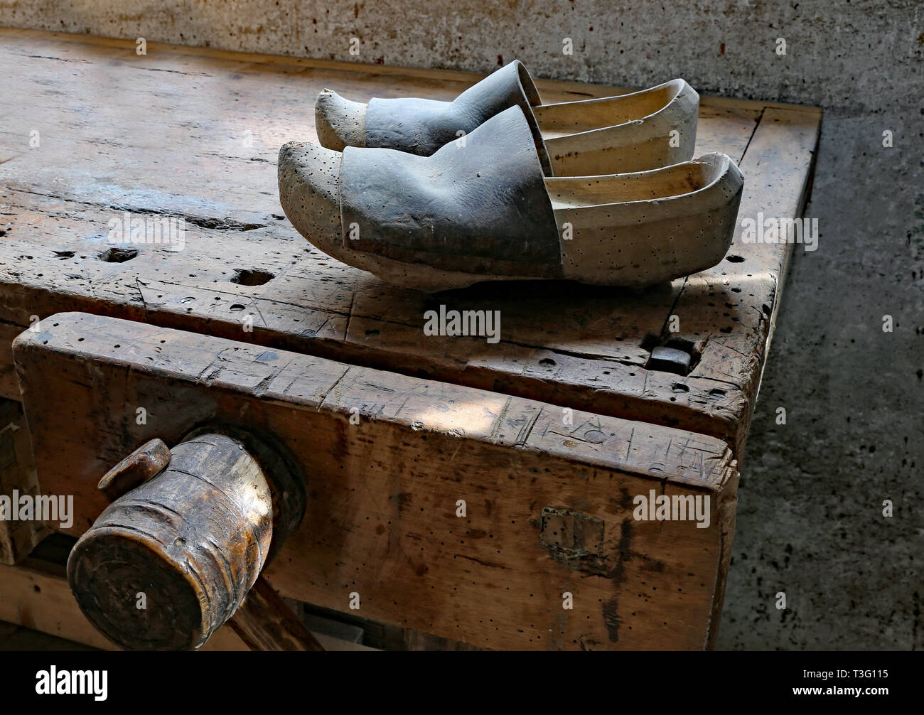 two Dutch wooden clogs in the Shoemaker's Workbench Stock Photo - Alamy