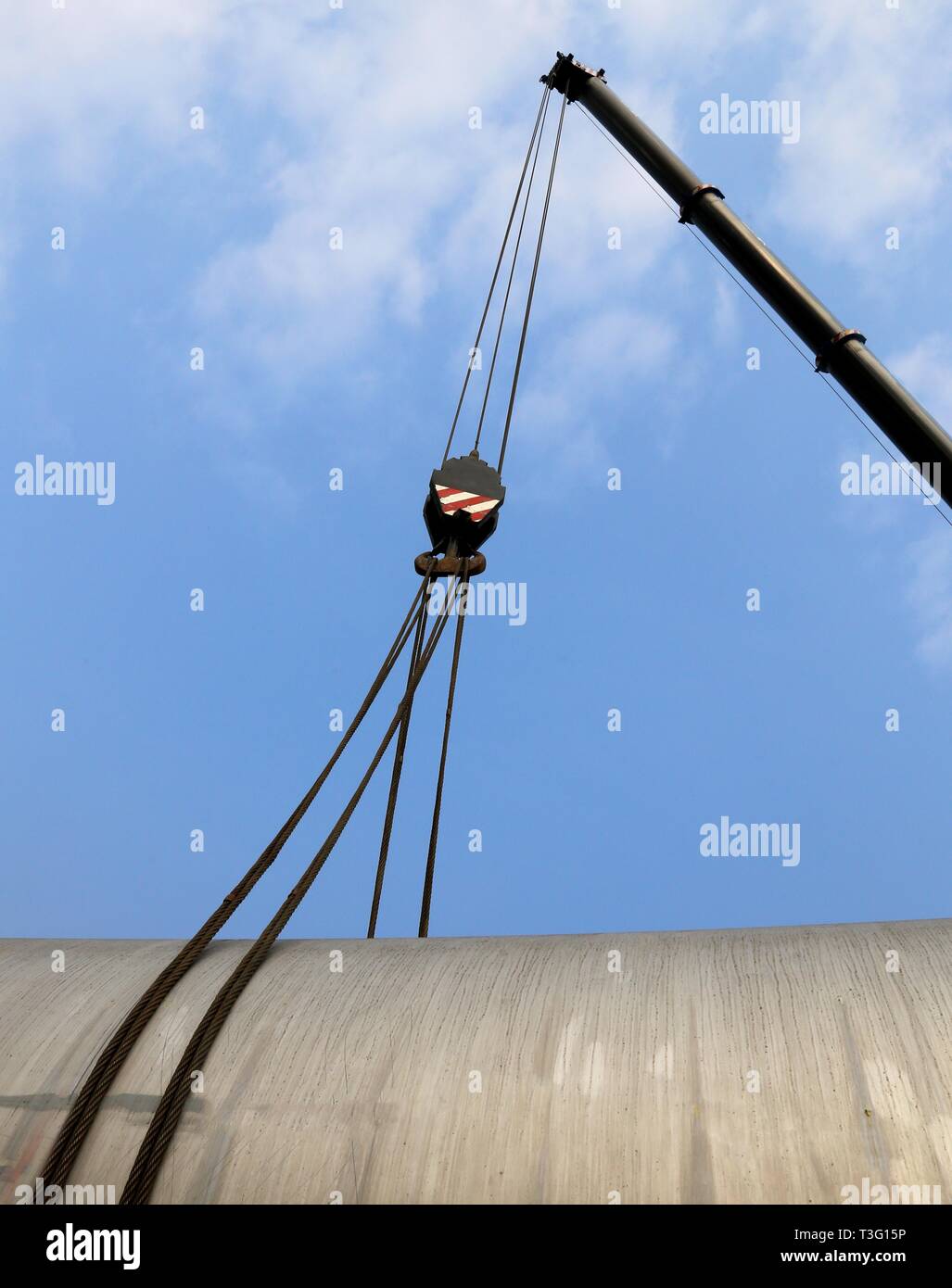 pulley with steel cables to lift heavy loads Stock Photo - Alamy