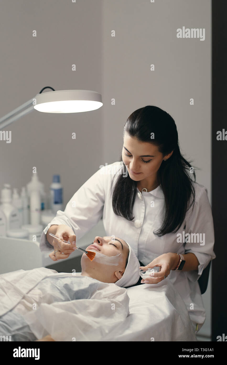 People, beauty, spa, cosmetology and skin care concept - Cosmetologist ...