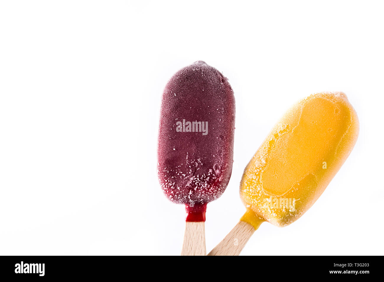 Yellow and red popsicle isolated on white background. Copyspace Stock ...
