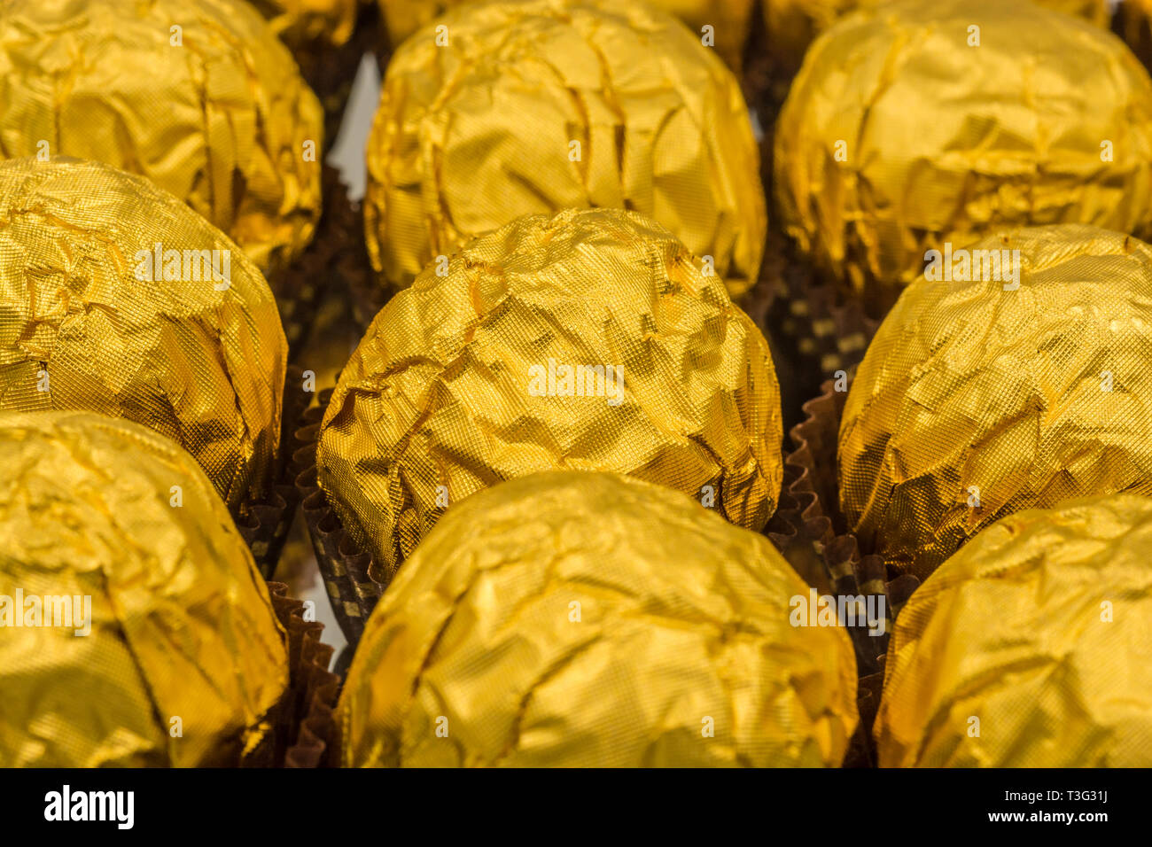 Foil wrapped sweet hi-res stock photography and images - Alamy
