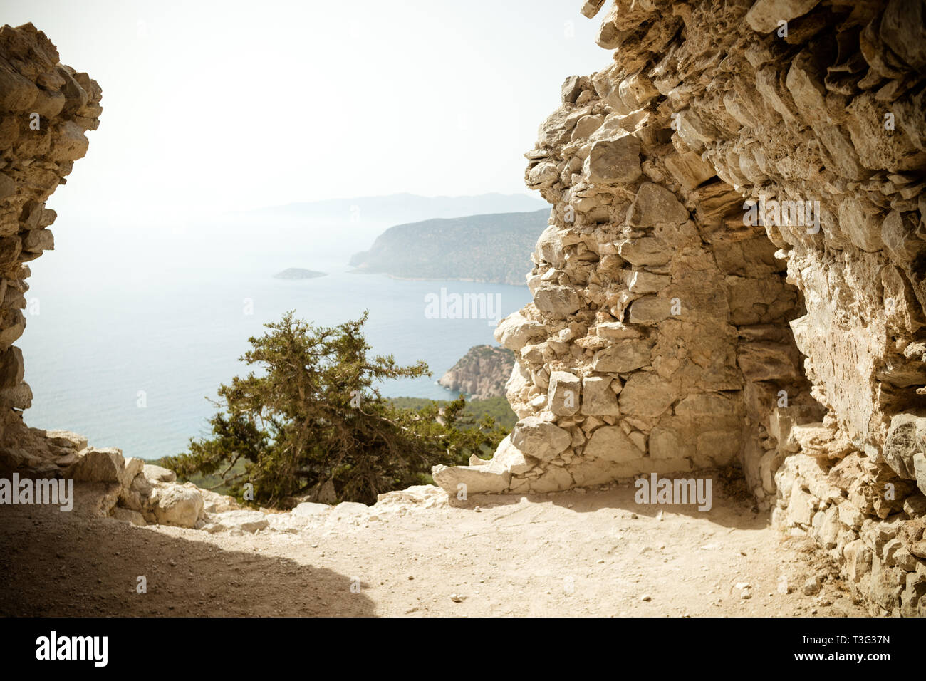 Ruins of a church in Monolithos castle and beautiful landscape view ...