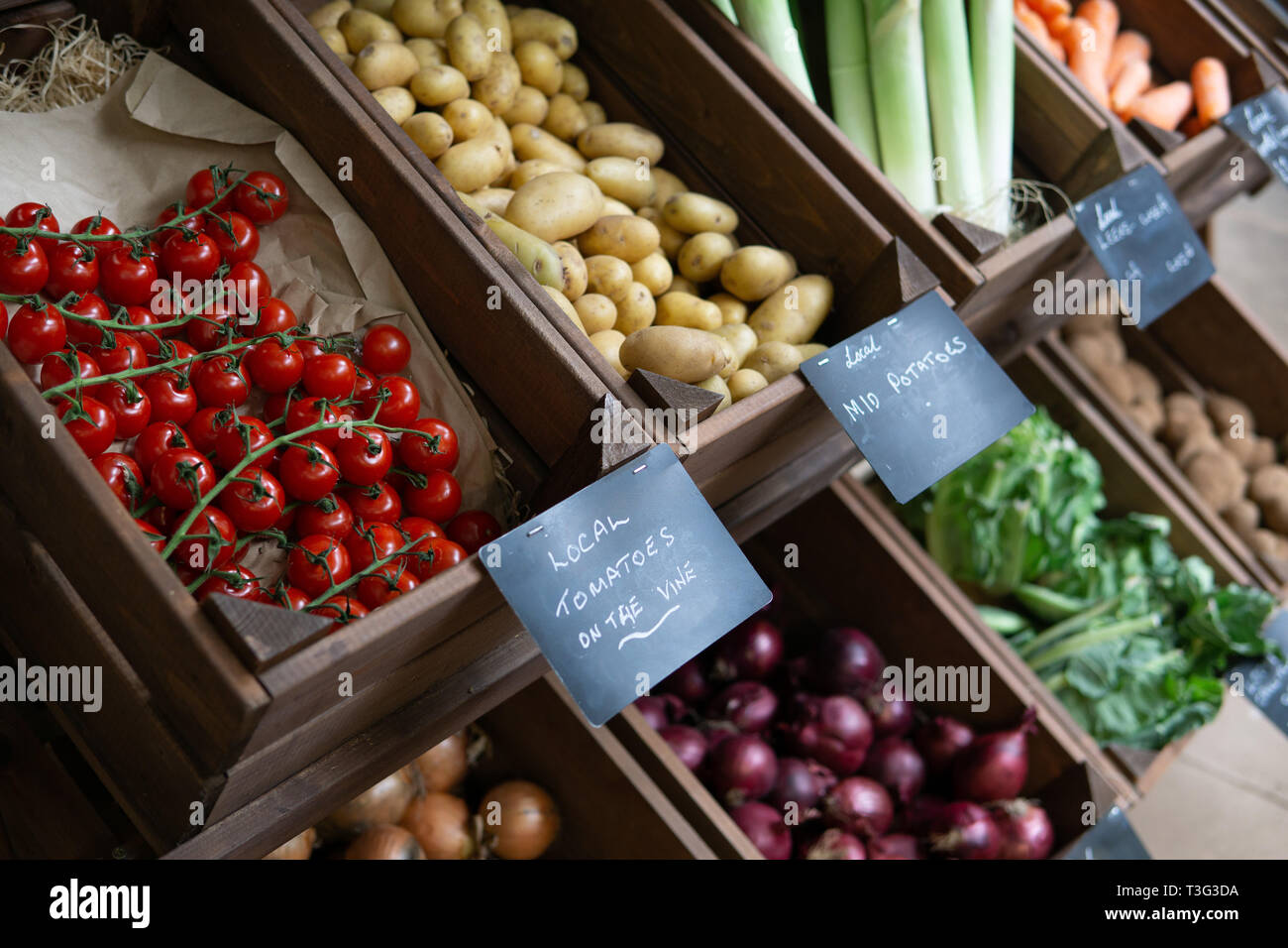 A rustic display of organic vegetables for sale at a farm shop Stock ...