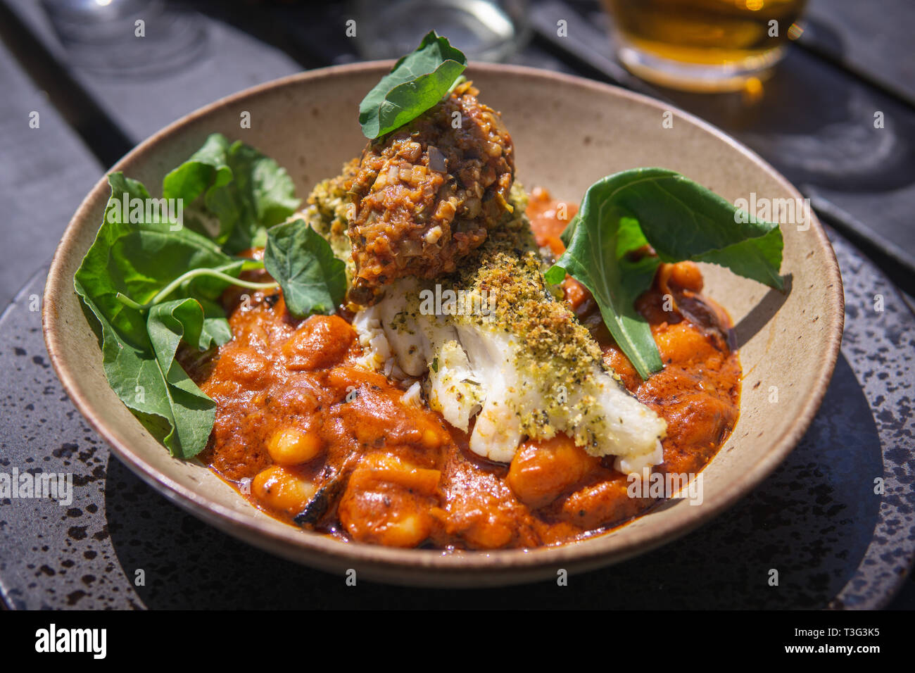 Fish tomato sauce beans hi-res stock photography and images - Alamy