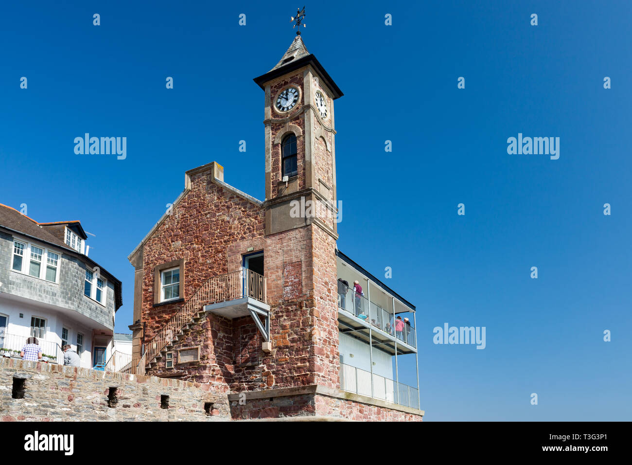 The historic clock tower at Kingsand a local landmark. Cornwall England ...