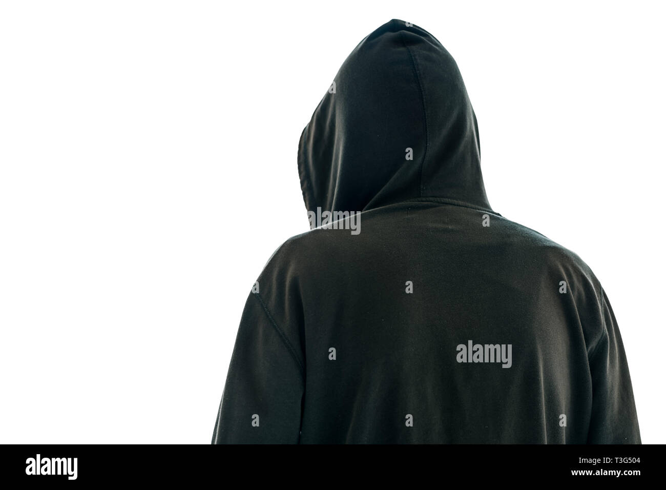 Rear view of hooded male person isolated on white background with copy ...
