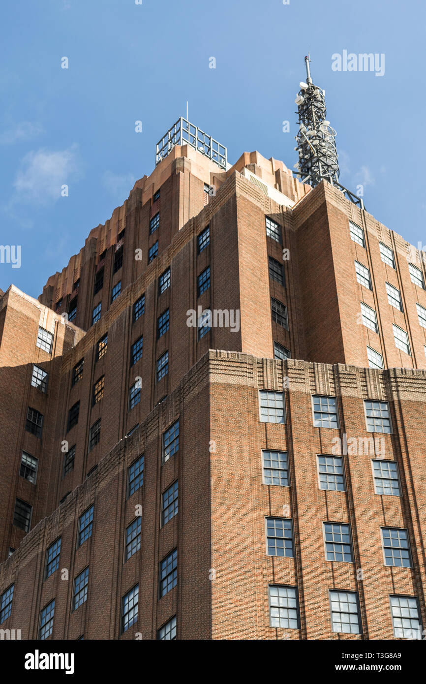 Tall building in Downtown Manhattan with metal antennae structure on ...