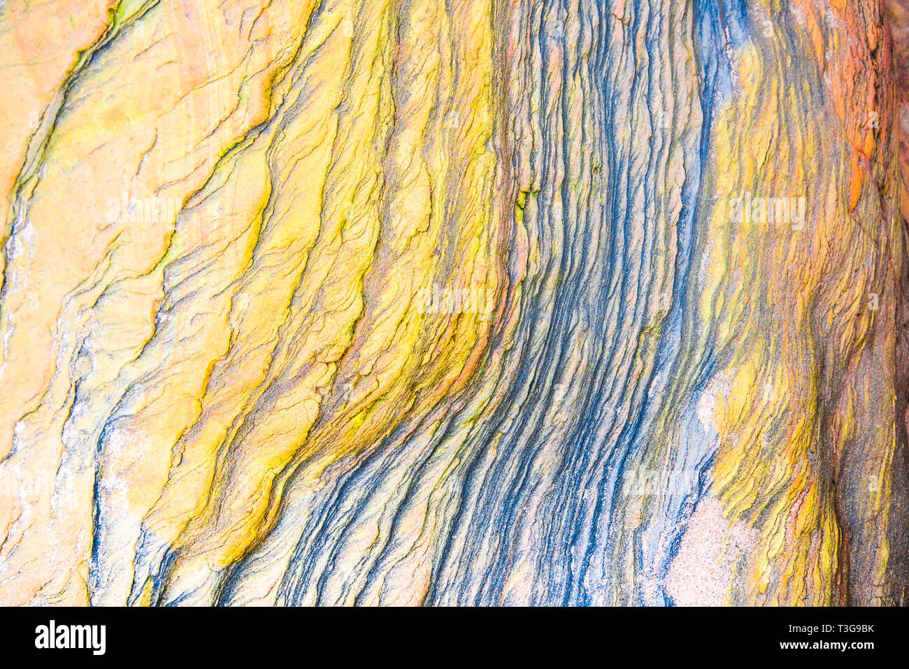 Colourful mosaics or rocks - layered sedimentary minerals exposed by ...