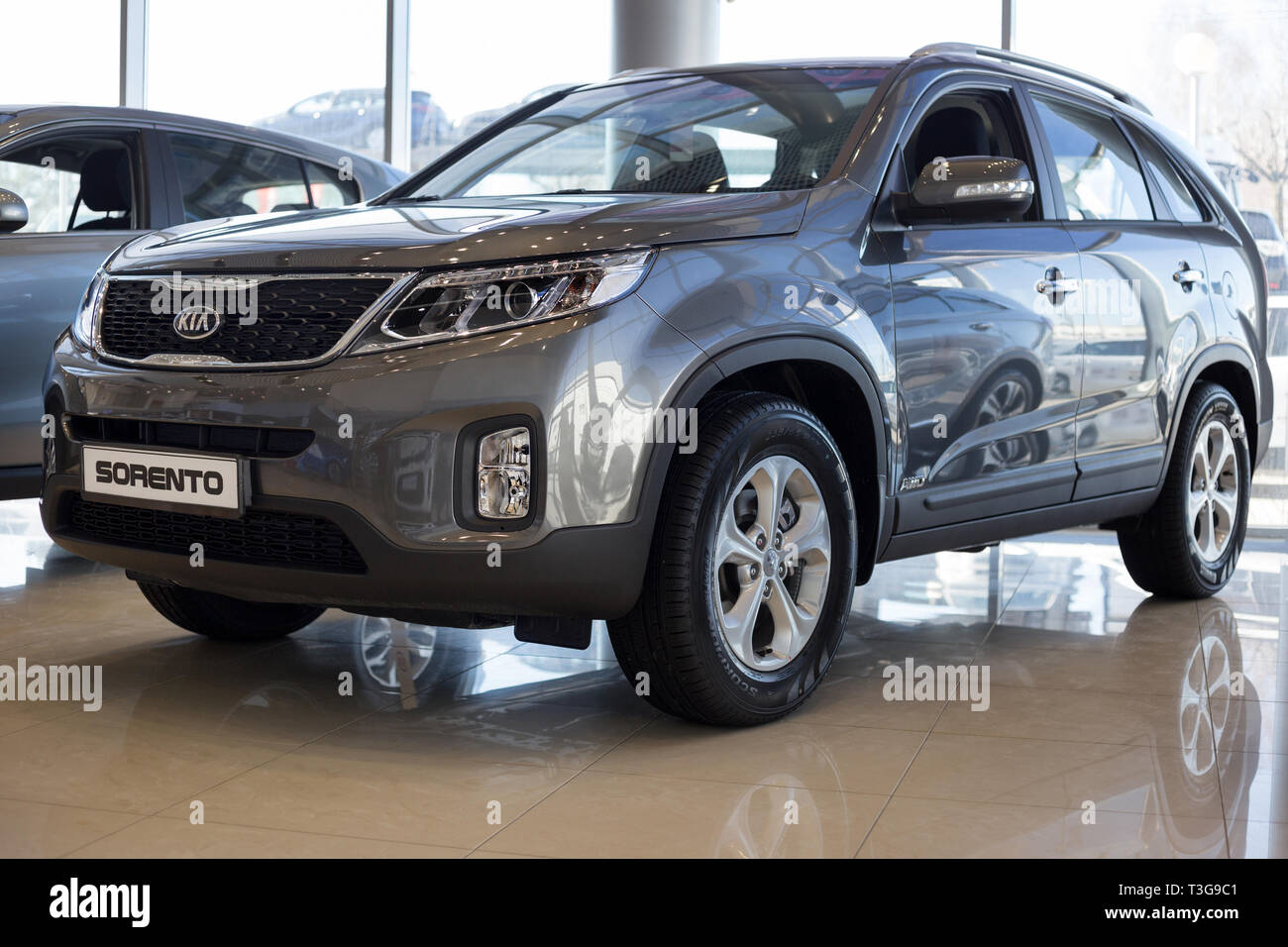 Russia, Izhevsk - April 4, 2019: New cars in the KIA showroom. Modern ...