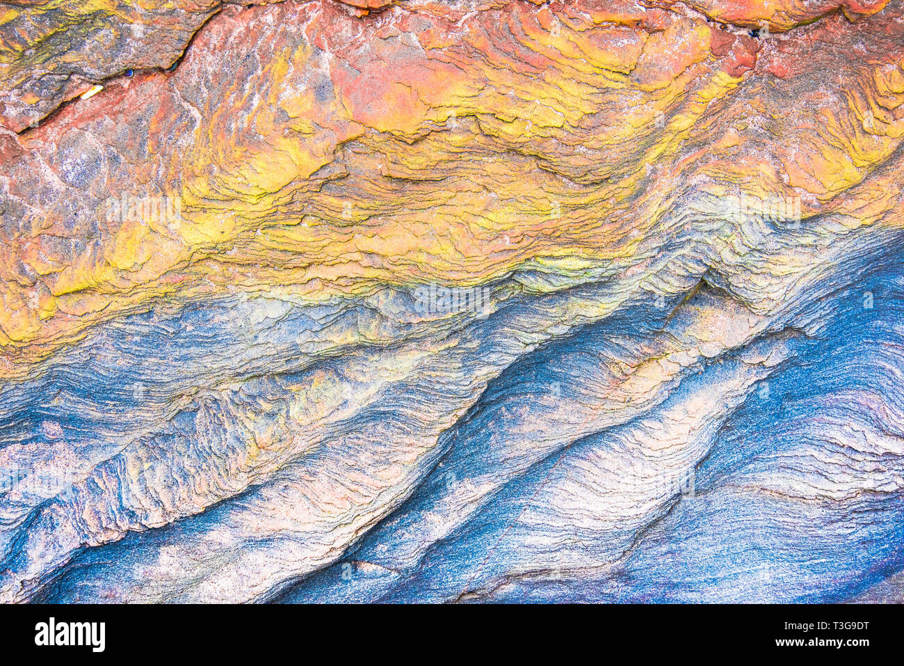 Colourful mosaics or rocks - layered sedimentary minerals exposed by ...