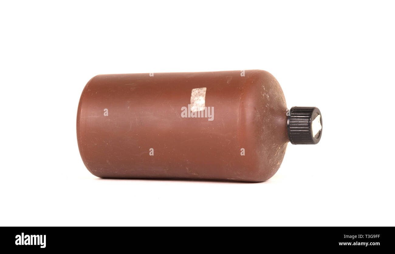 Photo developing equipment - Plastic bottle with chemicals, isolated on ...