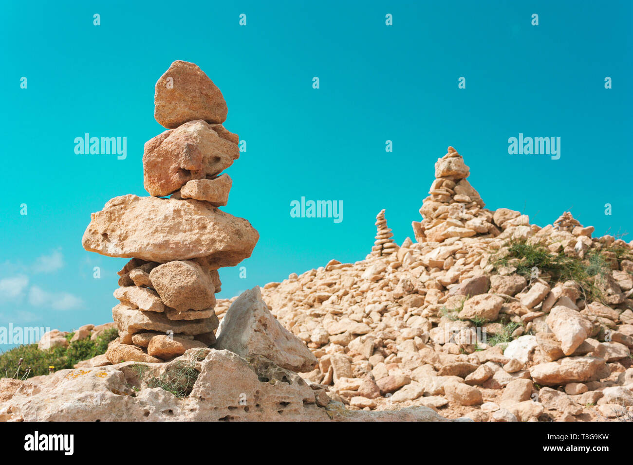 Balance of large stones on the beach, a mound. The concept of harmony ...
