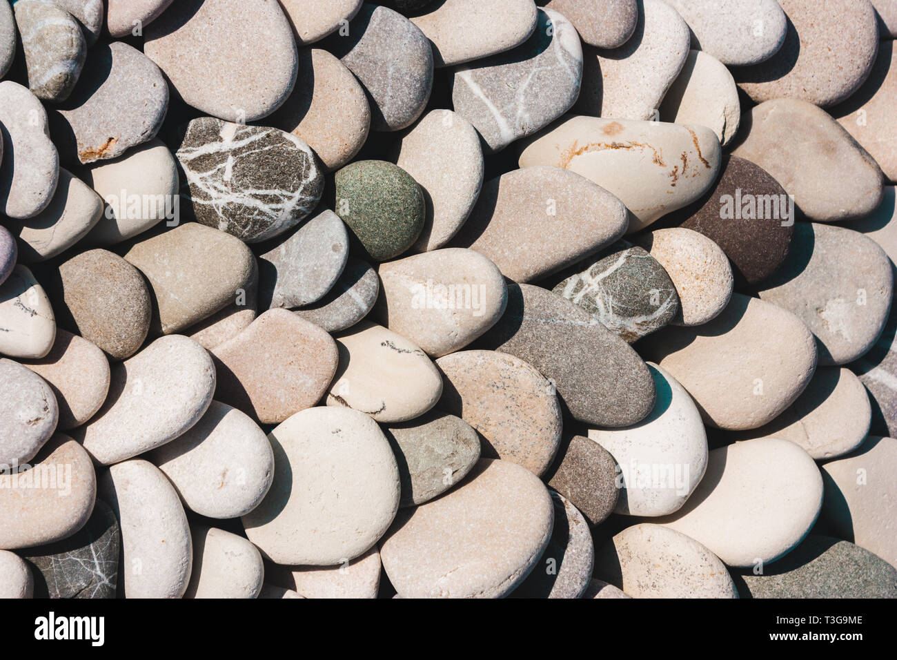 Marine naturally rounded gravel, pebbles in a row. Nature Background ...