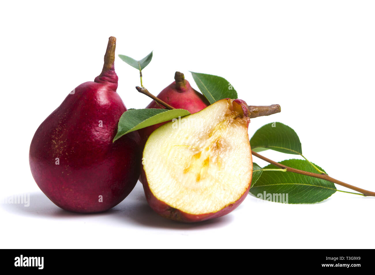 Red pear fruits isolated on white background Stock Photo - Alamy