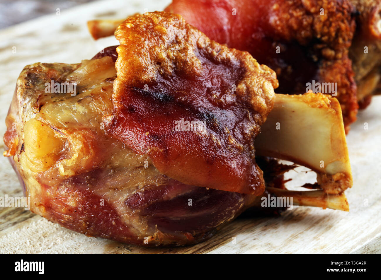 Roasted pork knuckle. Ham and bacon are popular foods in the west ...