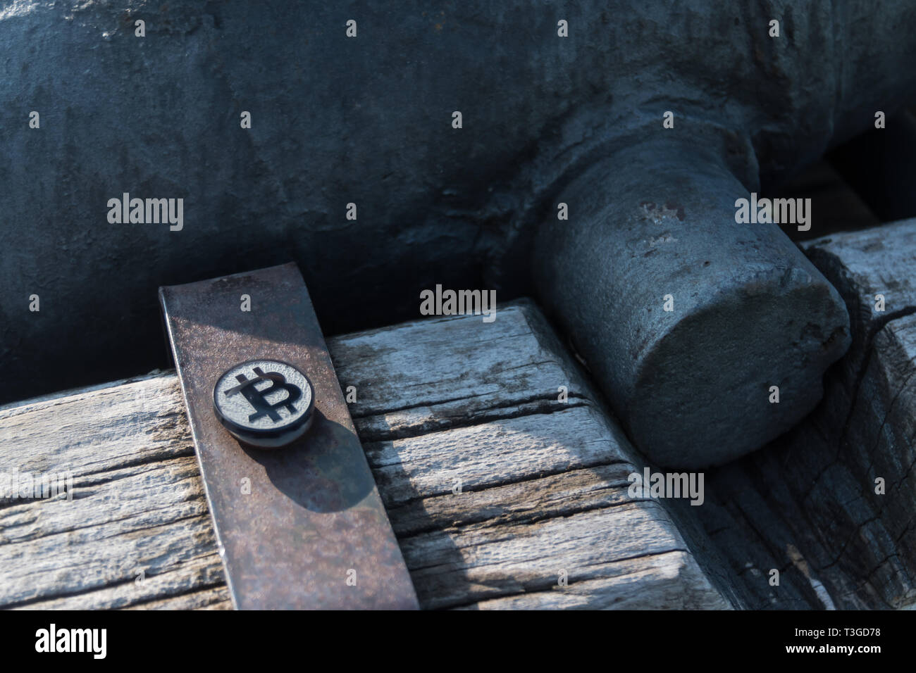 Made from black plastic custom bit coin on rustic old background Stock ...