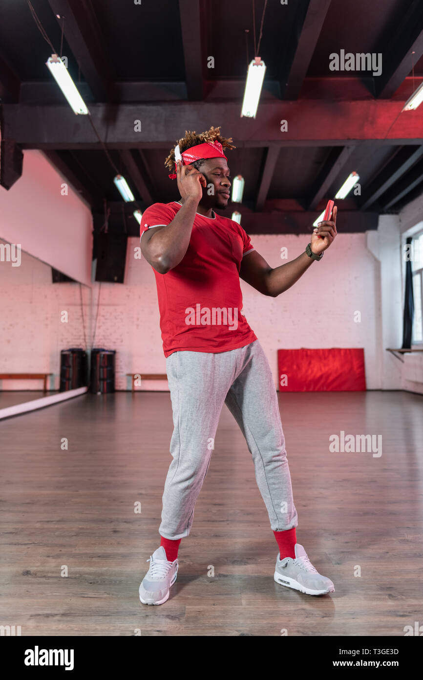 Wearing focused hi-res stock photography and images - Alamy