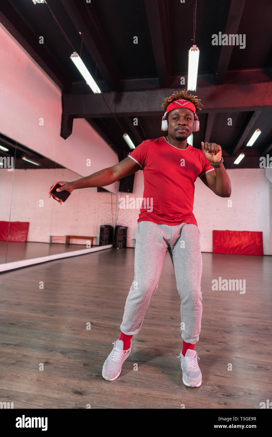 Young man dancing smartphone hi-res stock photography and images - Alamy