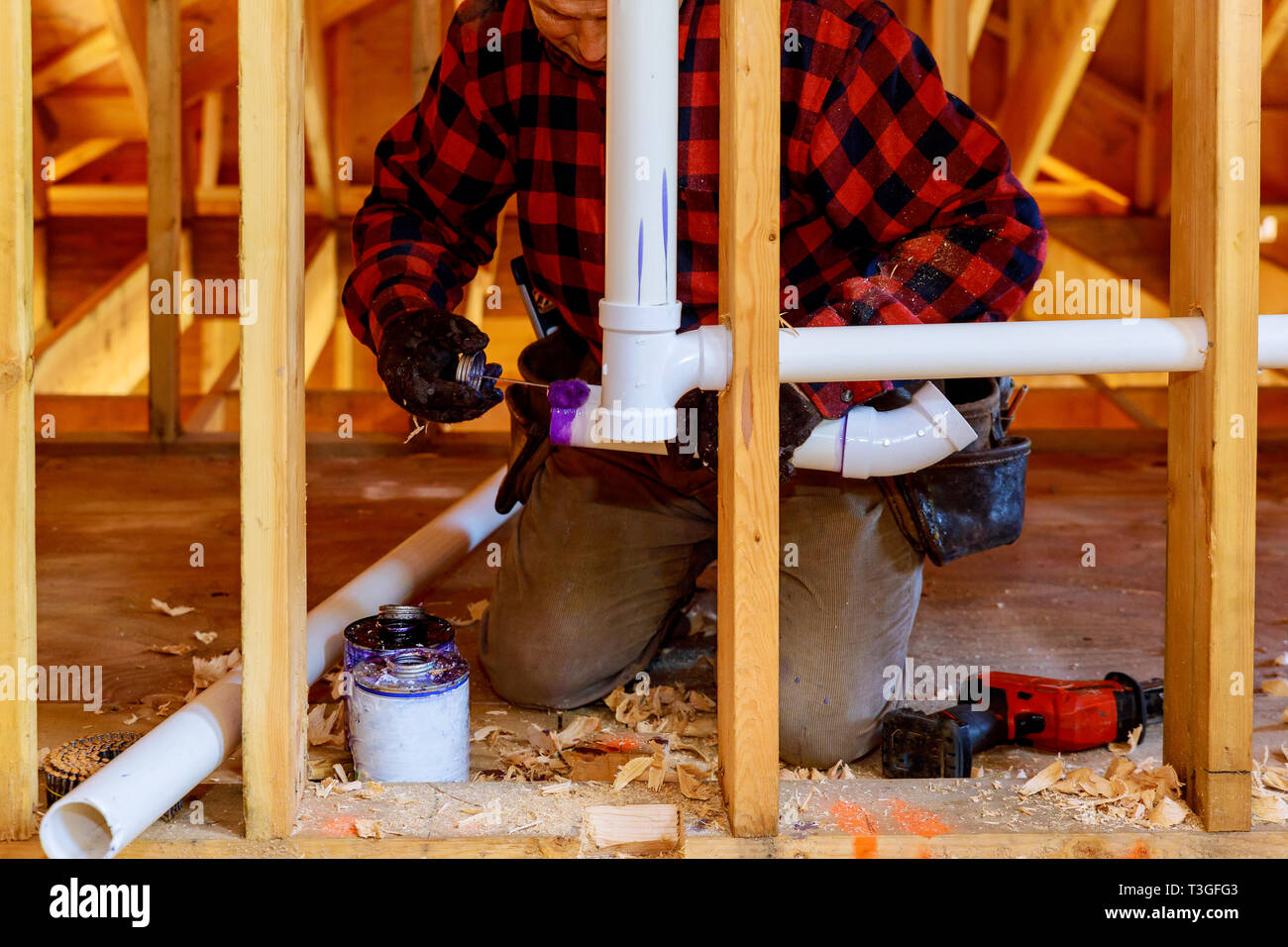 Applying plumber pipe drain and vent plumbing system at renovation new ...