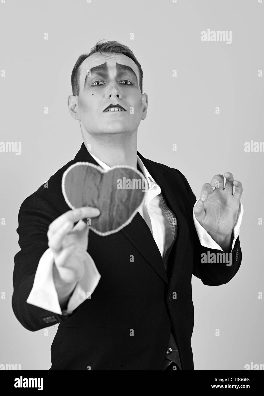 Serious about someone. Love confession on valentines day. Mime man hold ...