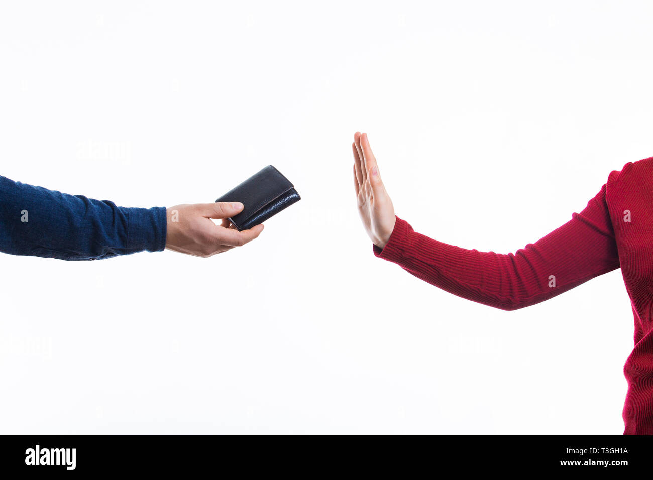A man hand holding wallet and female hand rejecting to receive money ...