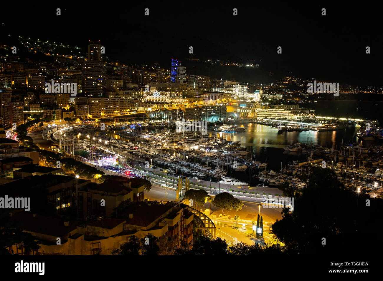 Panorama of Monte Carlo at night from the village of Monaco with Port ...