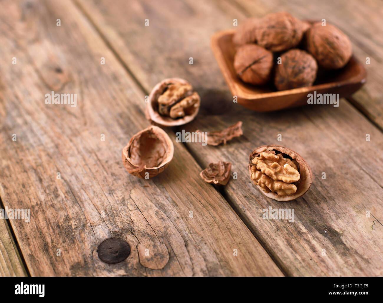 Walnuts on dark table close hi-res stock photography and images - Alamy