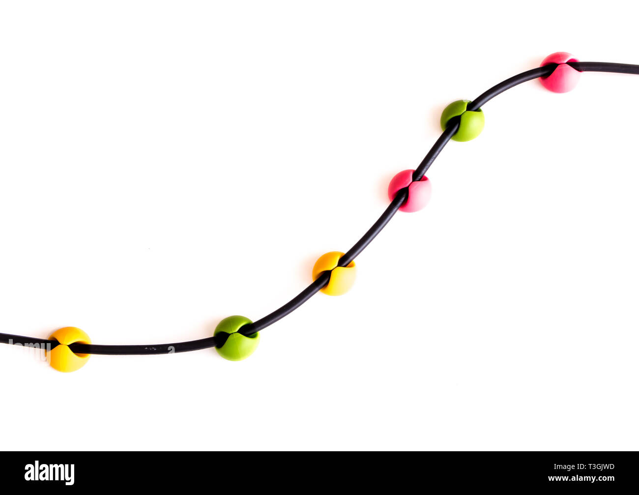 Colorful wall stick wire clip Stock Photo - Alamy