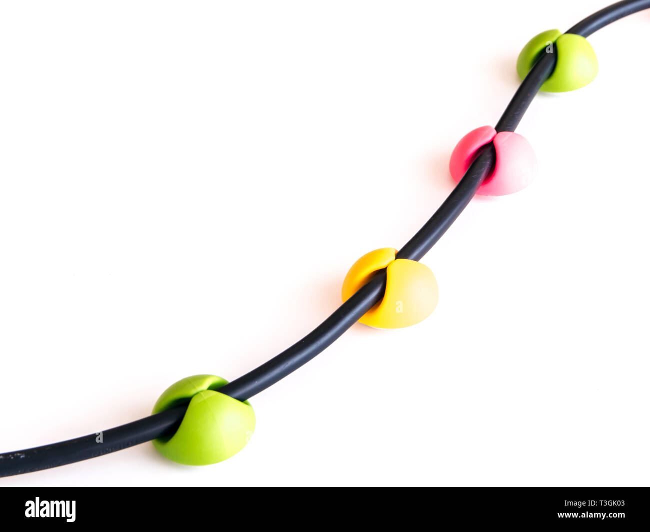 Yellow, Green and Pink the Colorful wall stick wire clip Stock Photo ...