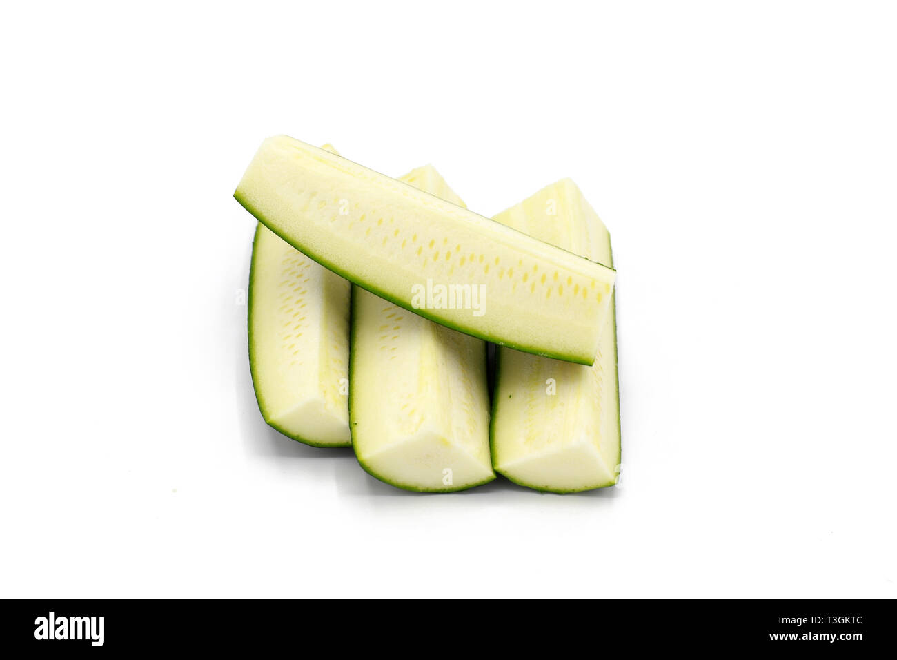 fresh zucchini stripes - isolated on white Stock Photo - Alamy
