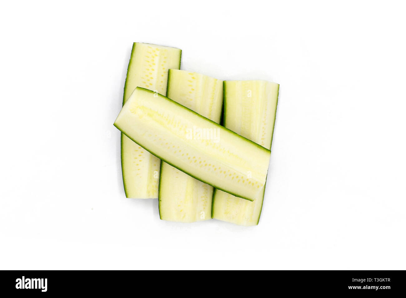 fresh zucchini stripes - isolated on white Stock Photo - Alamy