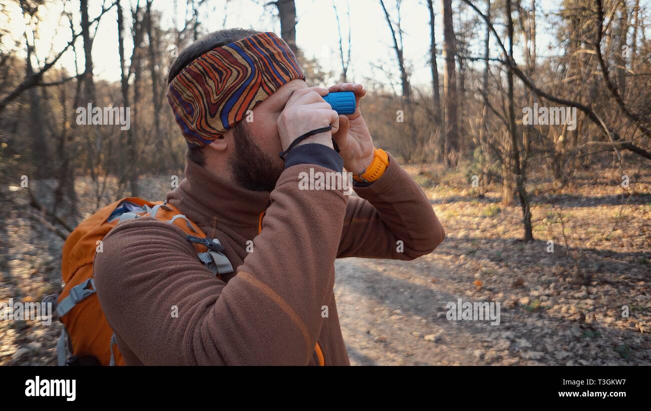 Tourist traveler tourist Caucasian man with a beard and a backpack ...