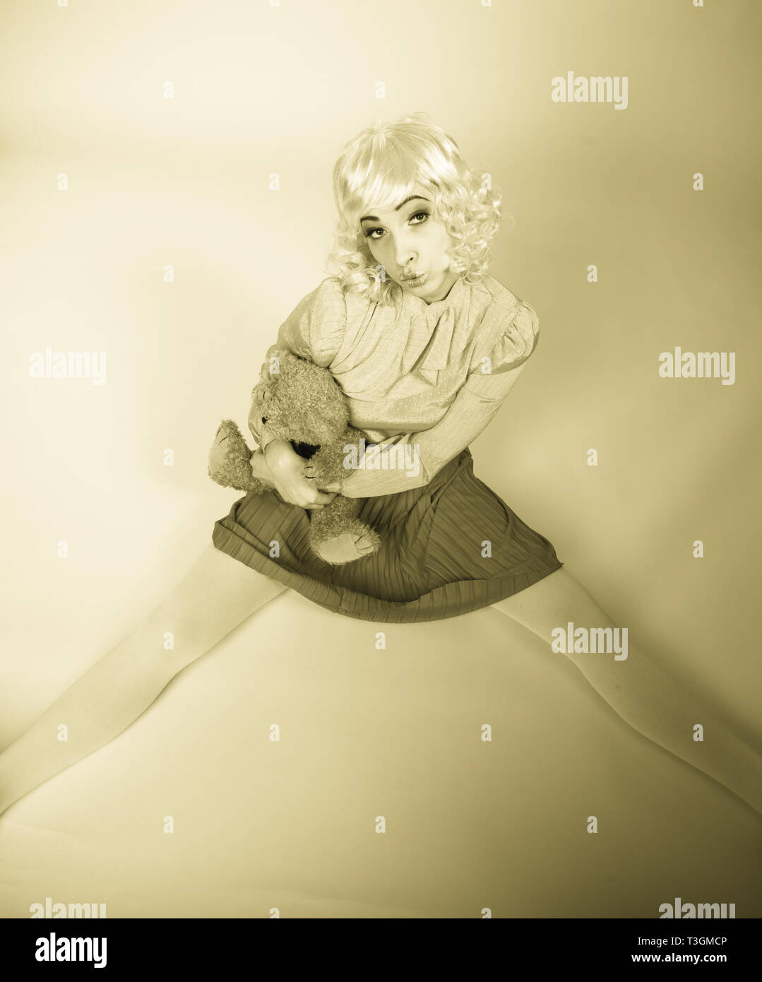Mental disorder concept. Young childlike woman wearing like puppet doll ...