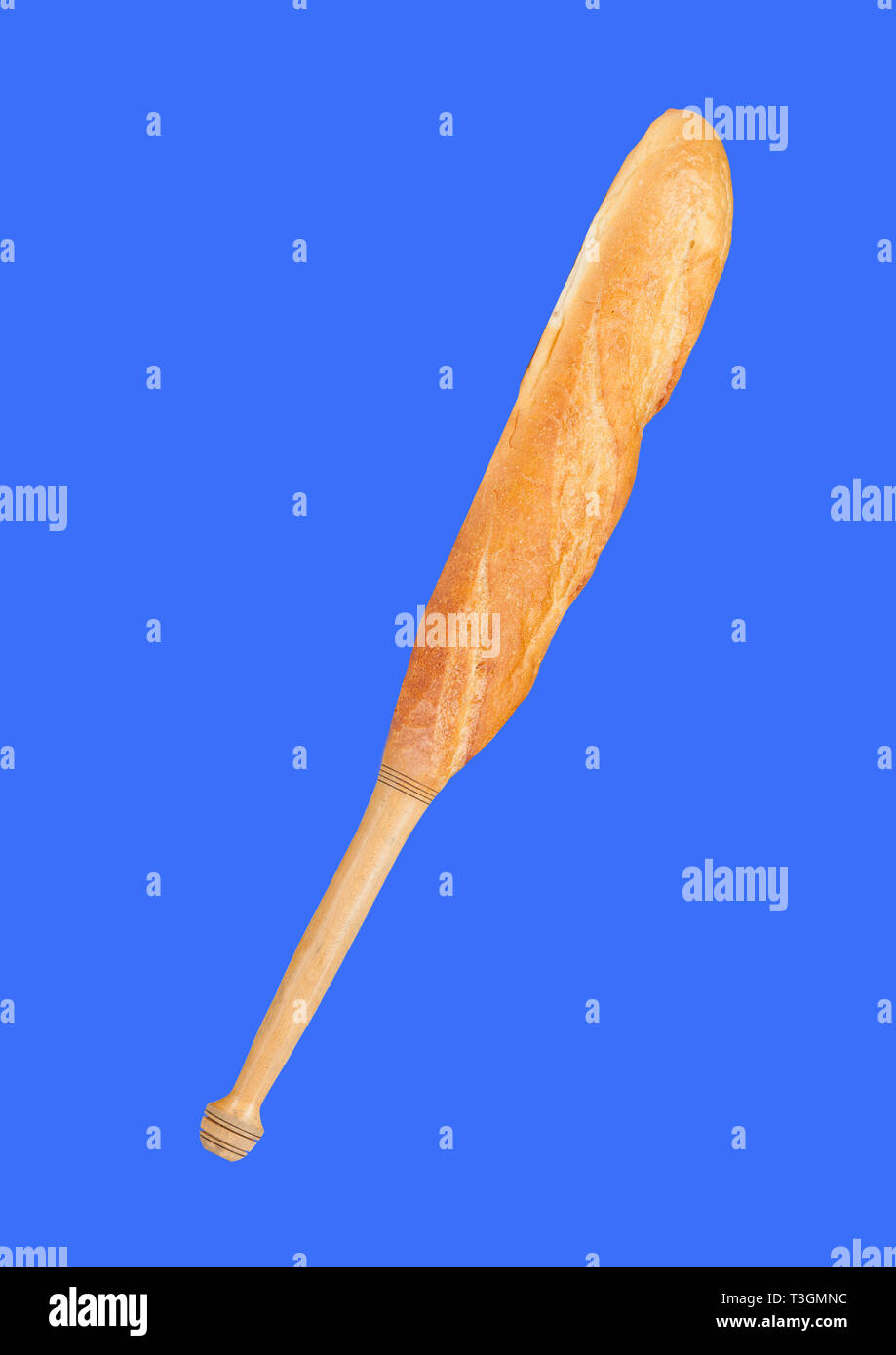 Bread is a head of dinner. Fresh baguette as a sport or baseball bat ...