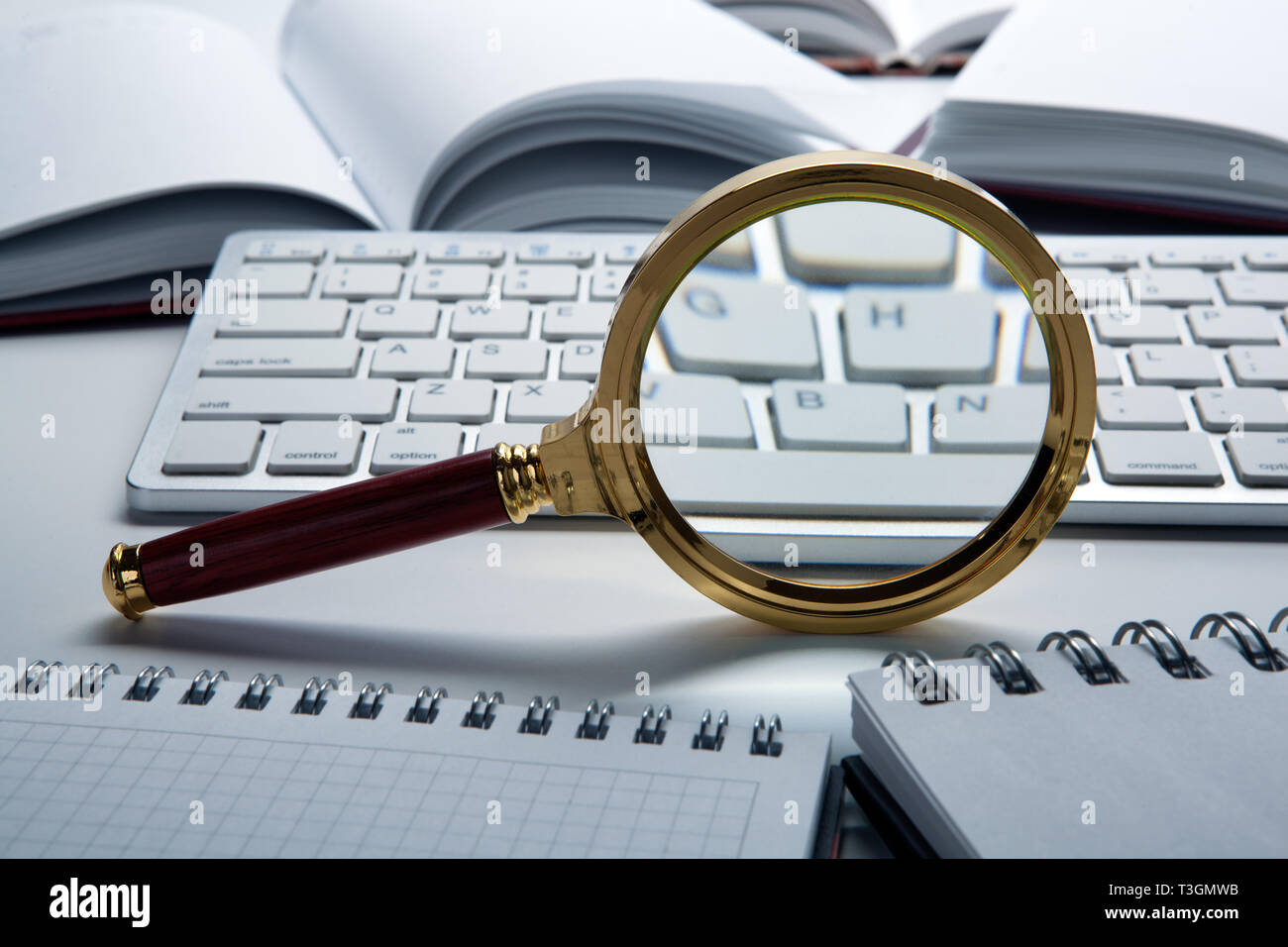 magnifying glass on the pc keyboard search technology concept Stock ...