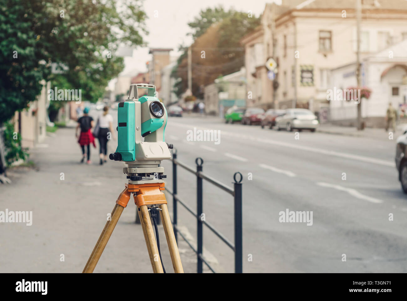 Surveyor device electronic total station on the street. Measurement of ...