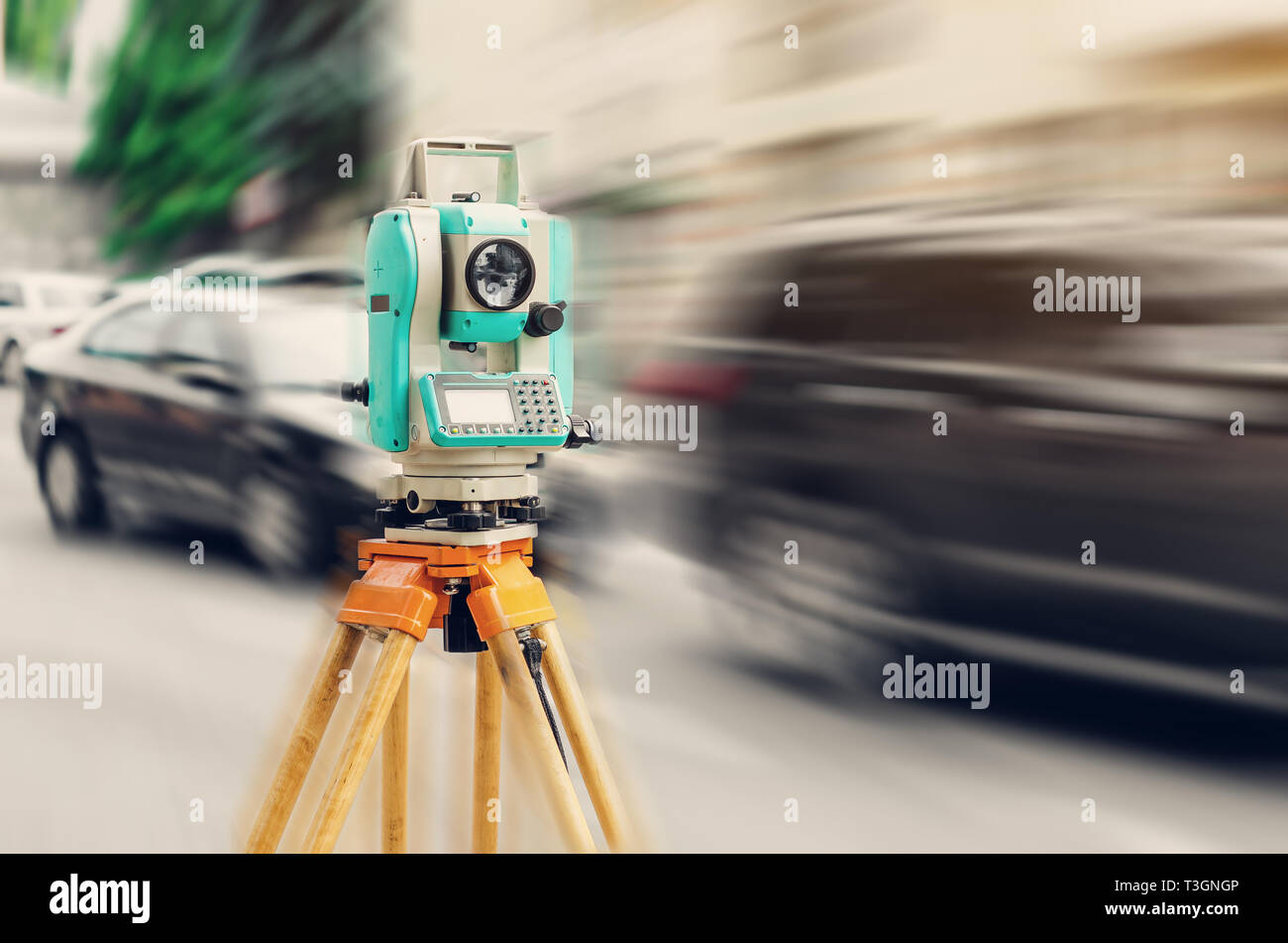 Surveyor device electronic total station on the street. Measurement of ...
