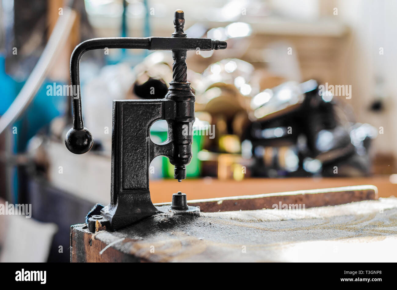 Vintage hand-press for setting rivets on clothes. The shoemaker's ...