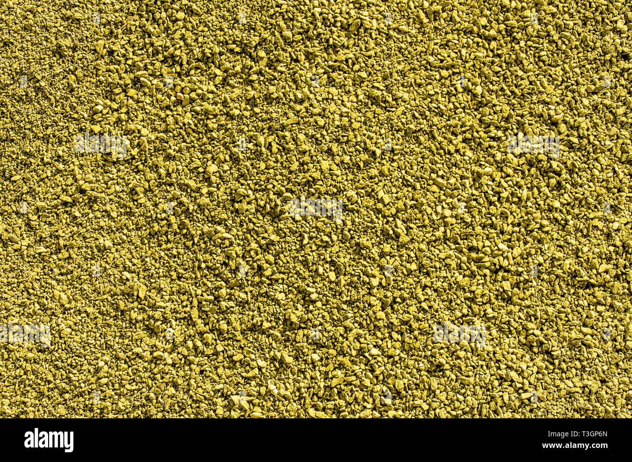 Fine grained gravel, yellow Stock Photo - Alamy