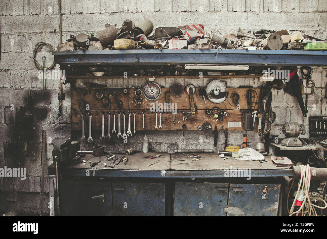 old metal table in a metalwork shop filled with tools Stock Photo - Alamy