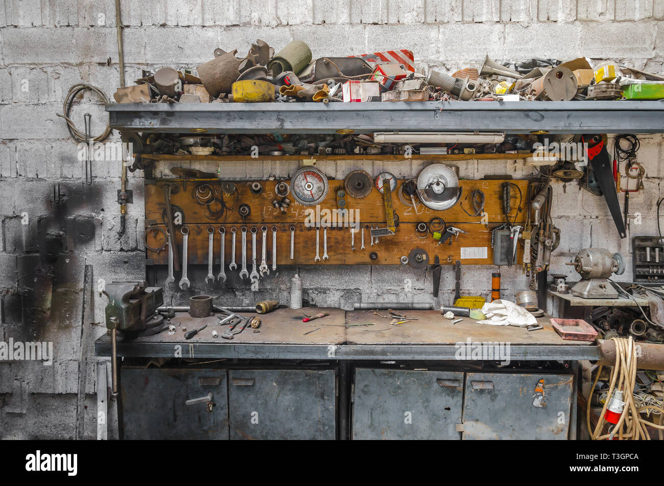 old metal table in a metalwork shop filled with tools Stock Photo - Alamy