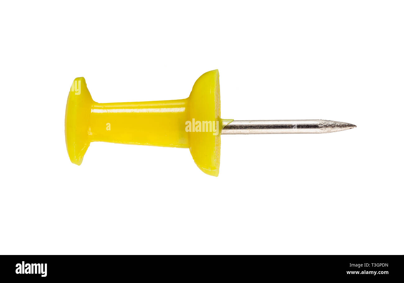 Extreme macro shot of a yellow pin showing the structure of the surface ...