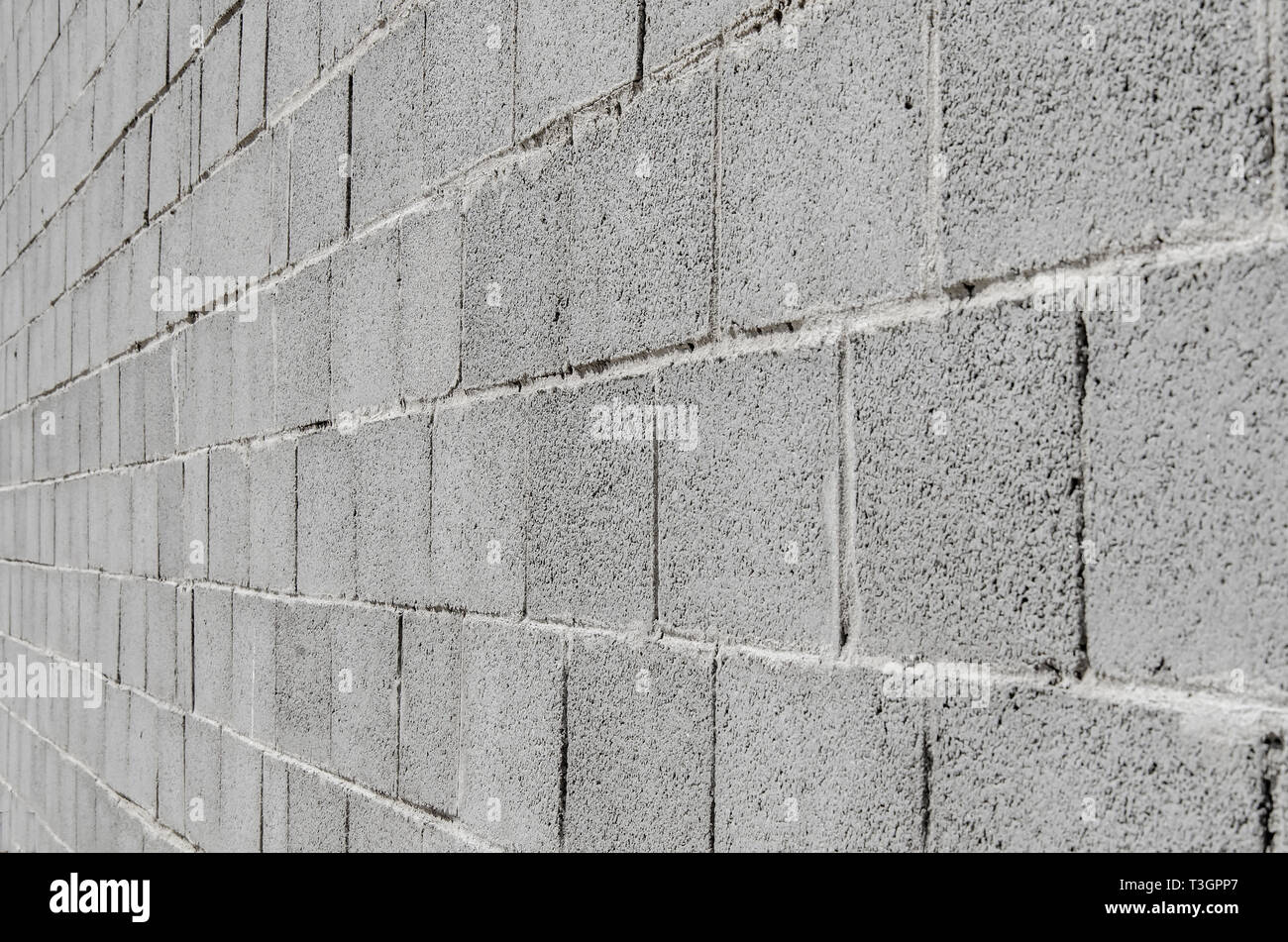 Wall of gray concrete blocks Stock Photo - Alamy