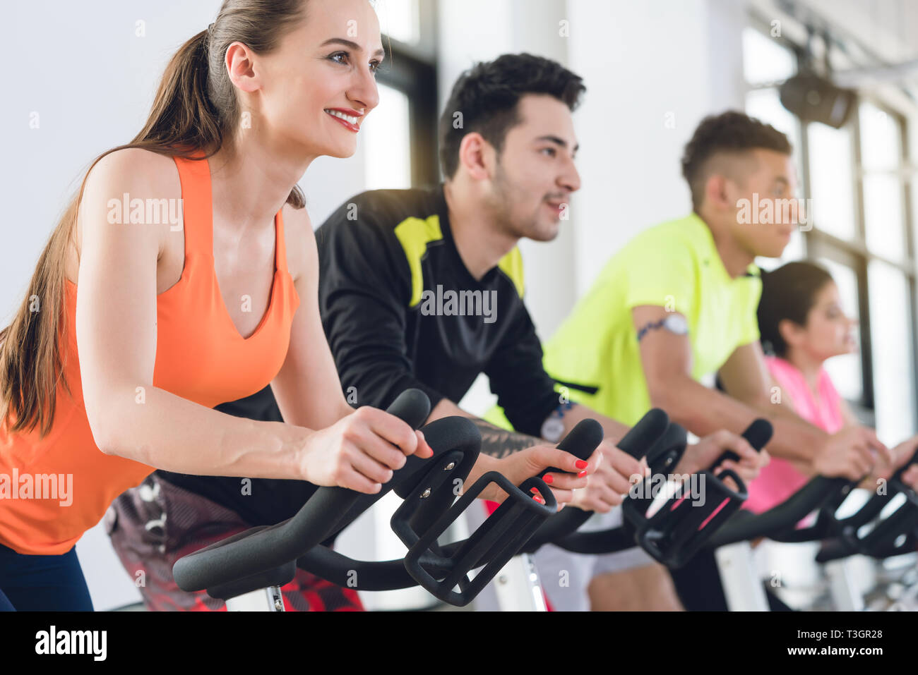 People exercising at fitness center Stock Photo - Alamy